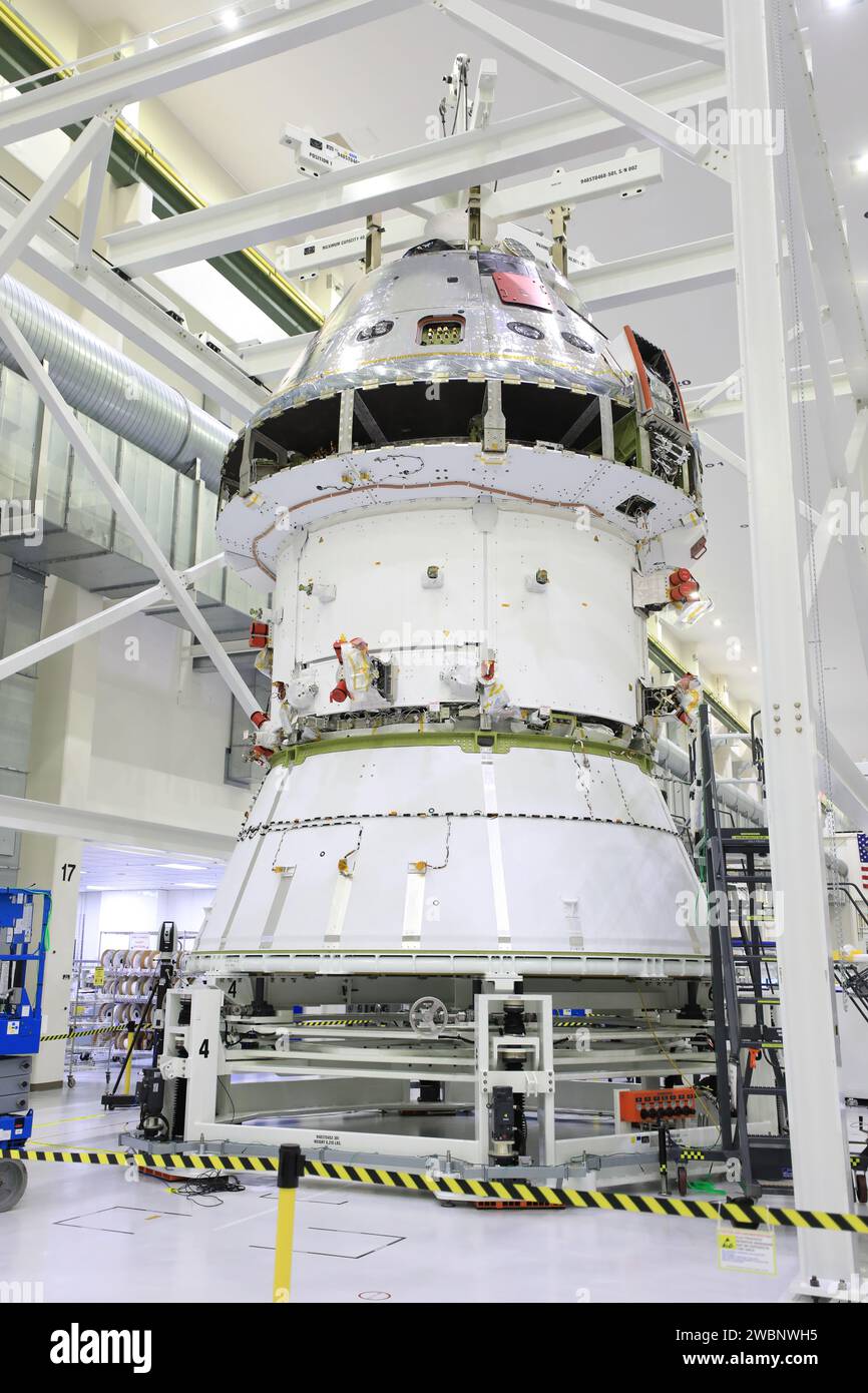 Installation of the spacecraft adapter (SA) cone to the Artemis I Orion ...