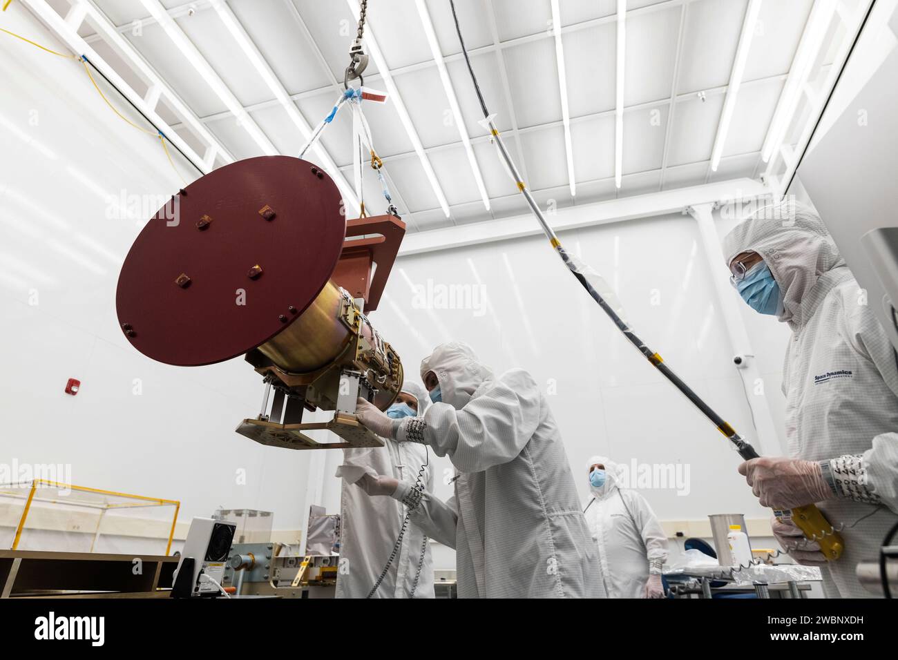 jsc2023e055879 (11/9/2022) --- Space Dynamics Laboratory (SDL) employees ensure the Opto ...