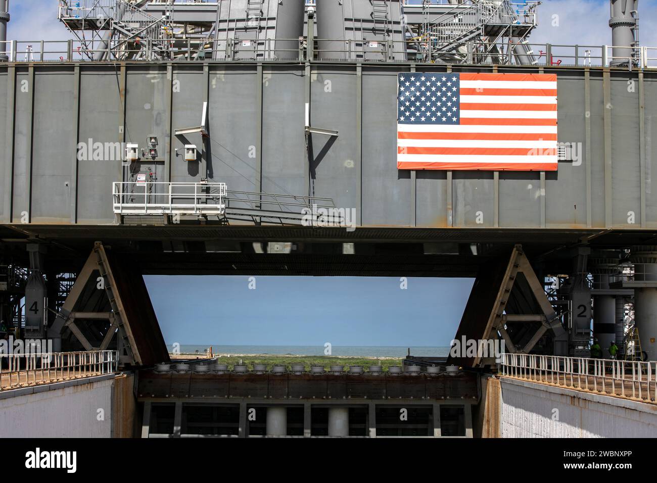 A close-up image shows the base of NASA’s nearly 400-foot-tall mobile ...