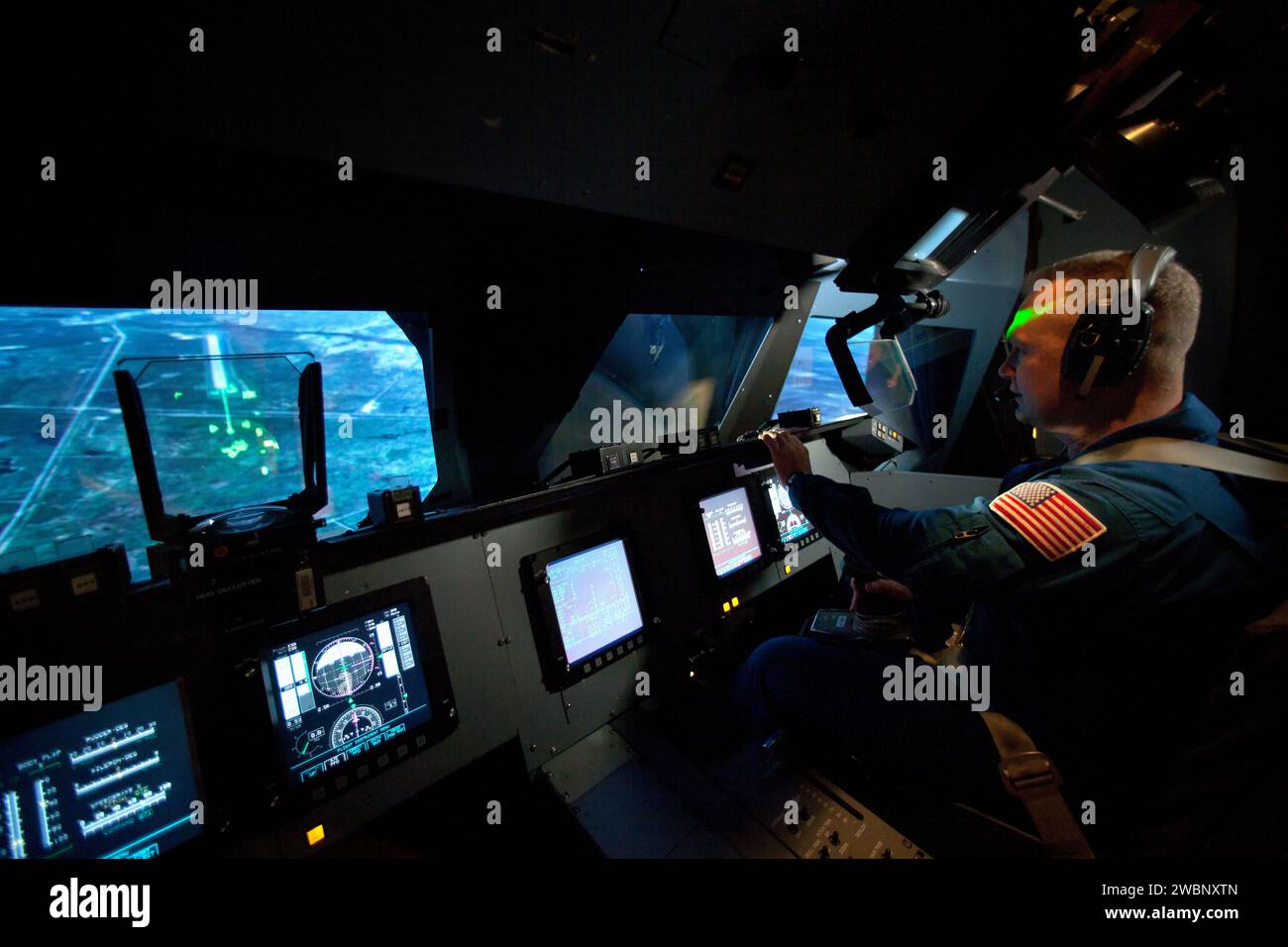 NASA astronaut Doug Hurley pilots a simulated landing a the Kennedy ...