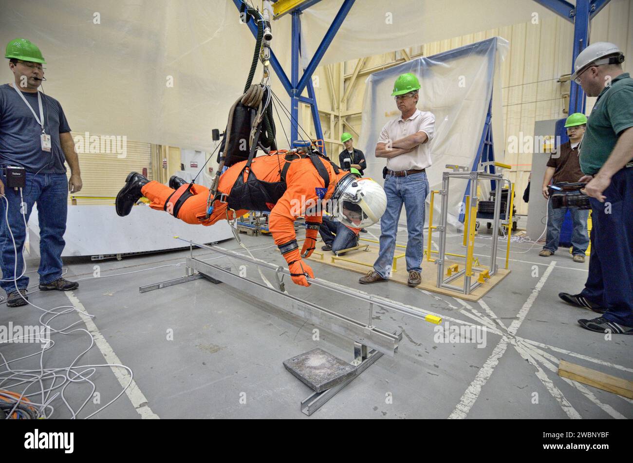 Astronaut Rex Walheim uses the Active Response Gravity Offload System ...