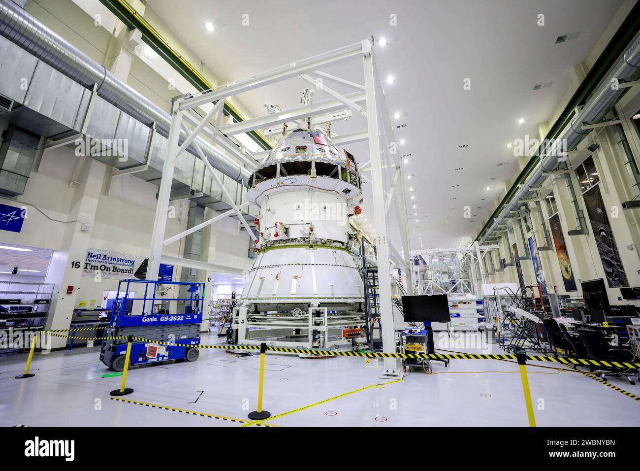 Technicians at NASA’s Kennedy Space Center in Florida working to ...