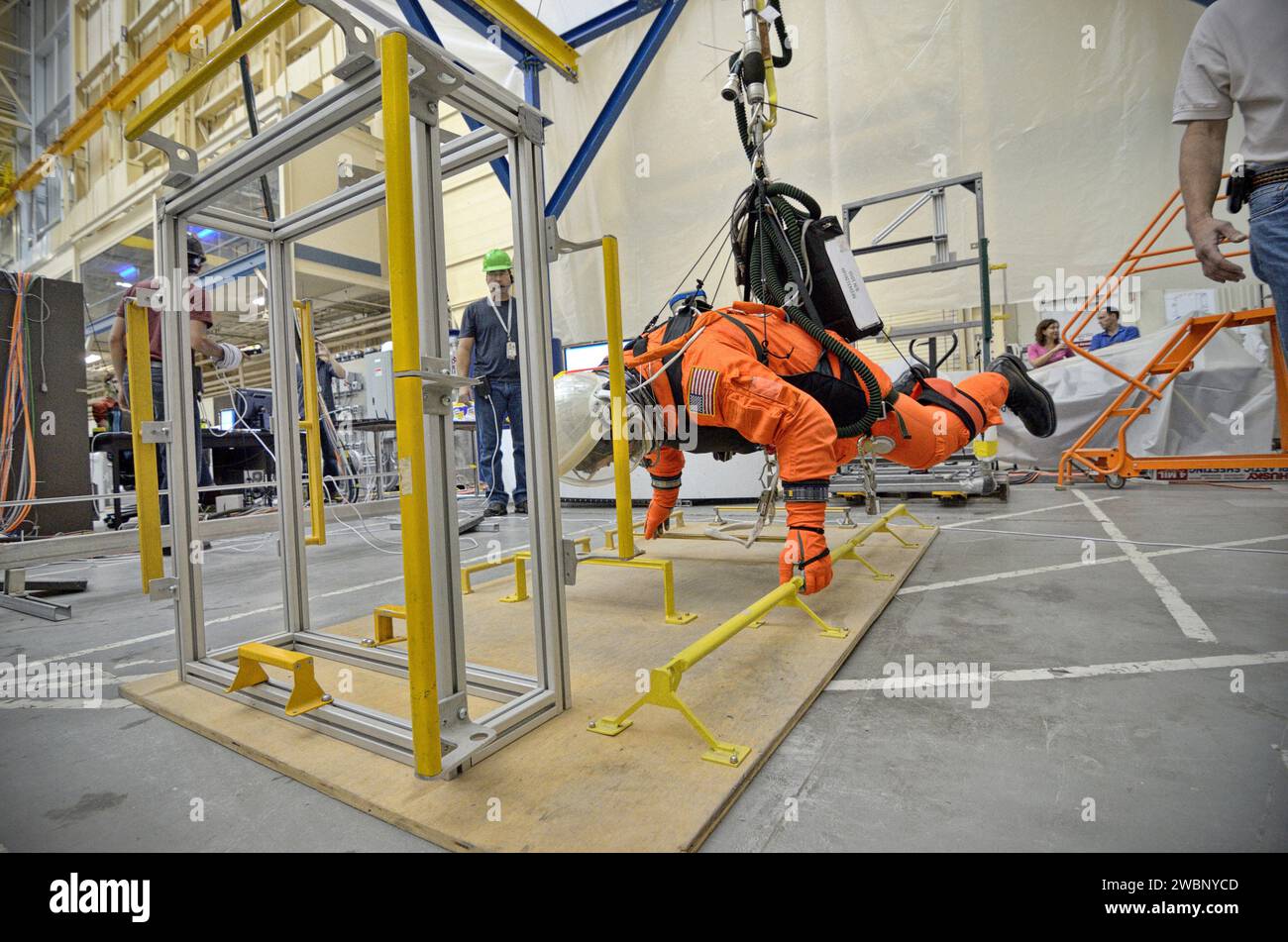 Astronaut Rex Walheim uses the Active Response Gravity Offload System ...