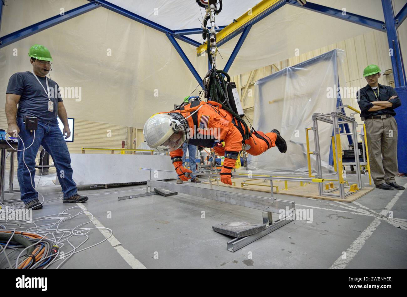 Astronaut Rex Walheim uses the Active Response Gravity Offload System ...
