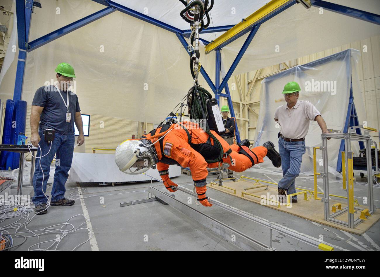 Astronaut Rex Walheim uses the Active Response Gravity Offload System ...
