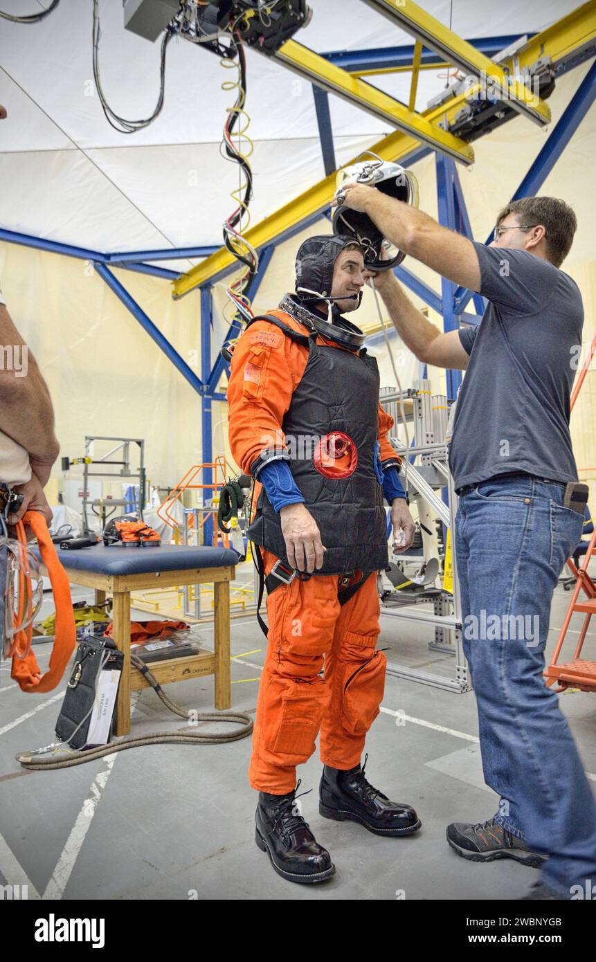 Astronaut Rex Walheim uses the Active Response Gravity Offload System ...