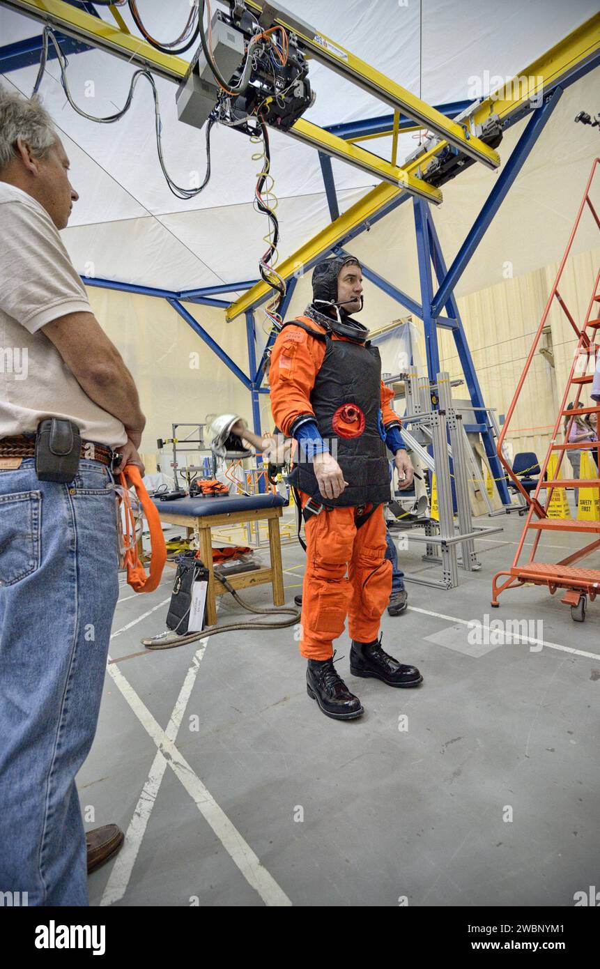 Astronaut Rex Walheim uses the Active Response Gravity Offload System ...