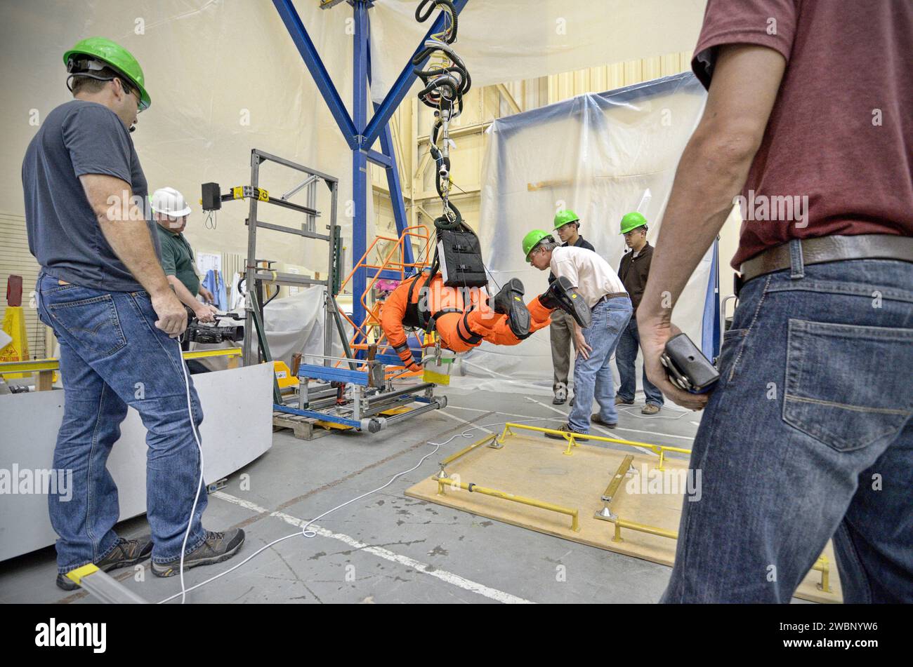 Astronaut Rex Walheim uses the Active Response Gravity Offload System ...