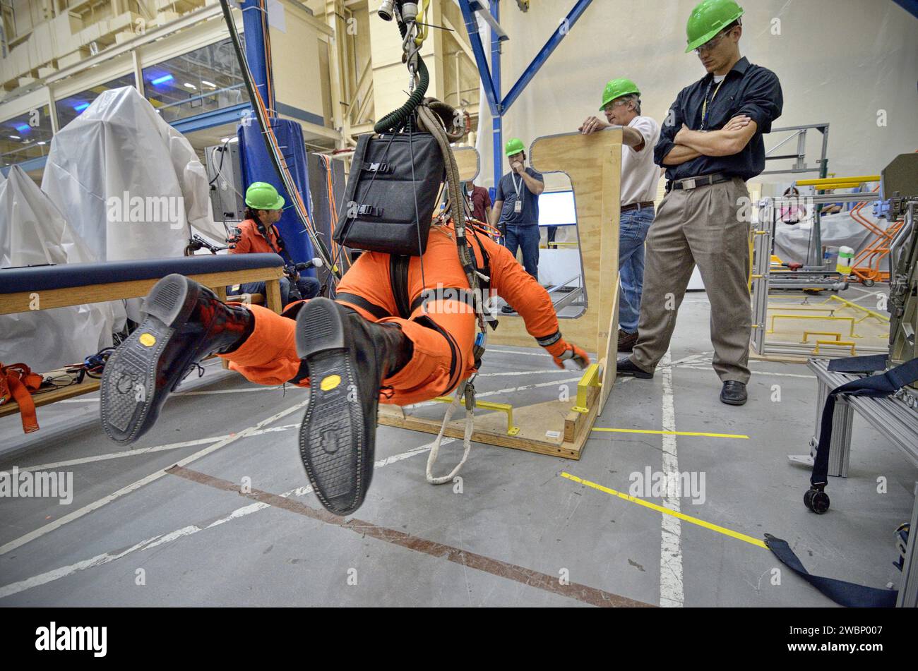 Astronaut Rex Walheim uses the Active Response Gravity Offload System ...