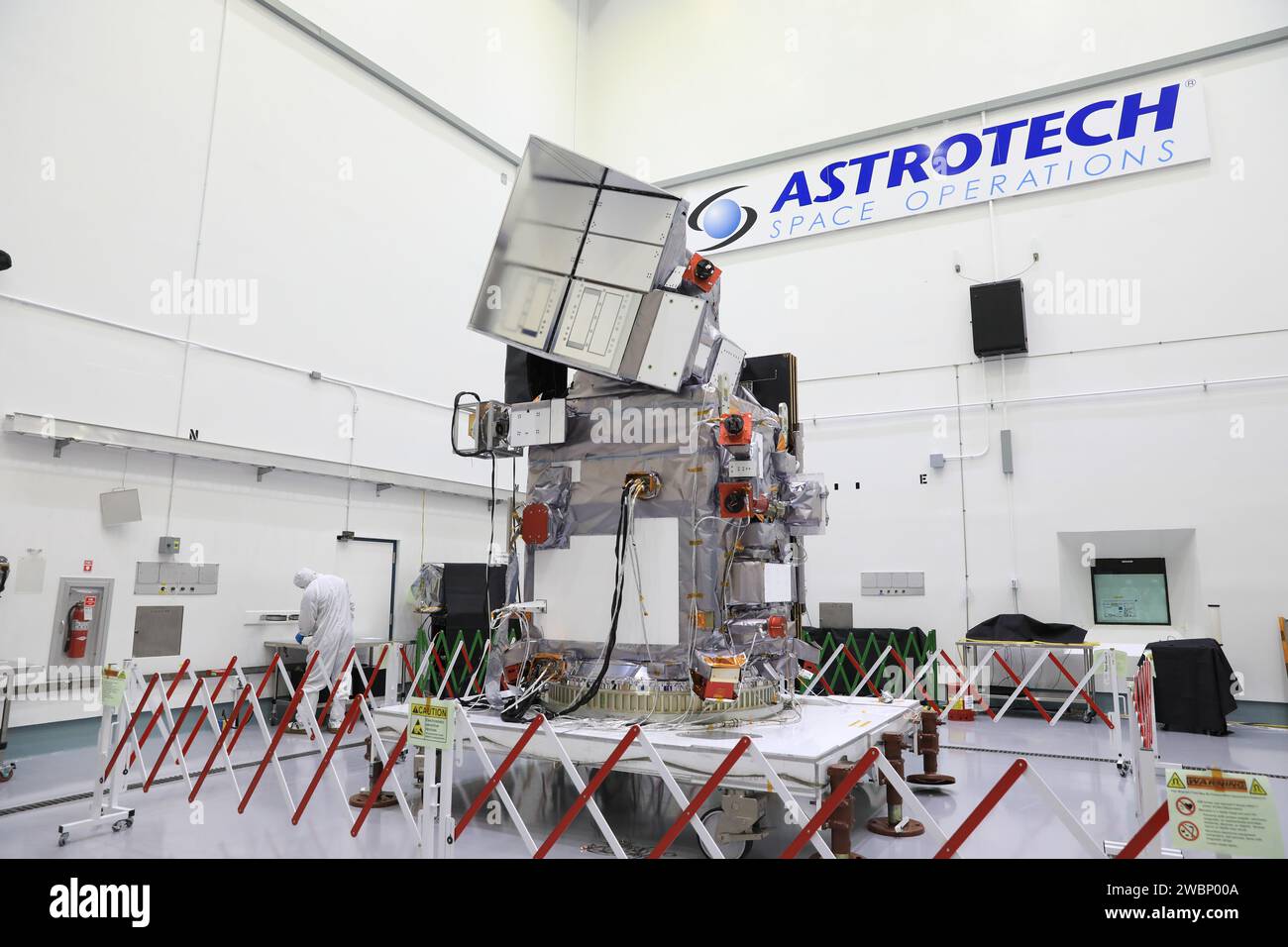 Technicians work to process the NASA’s Plankton, Aerosol, Cloud, ocean ...