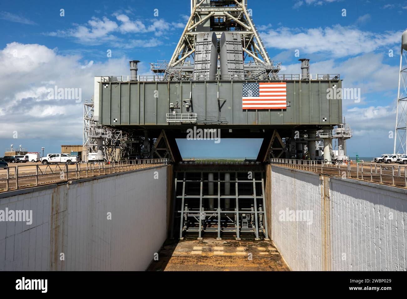 A close-up view of the mobile launcher for Artemis I with the two side ...
