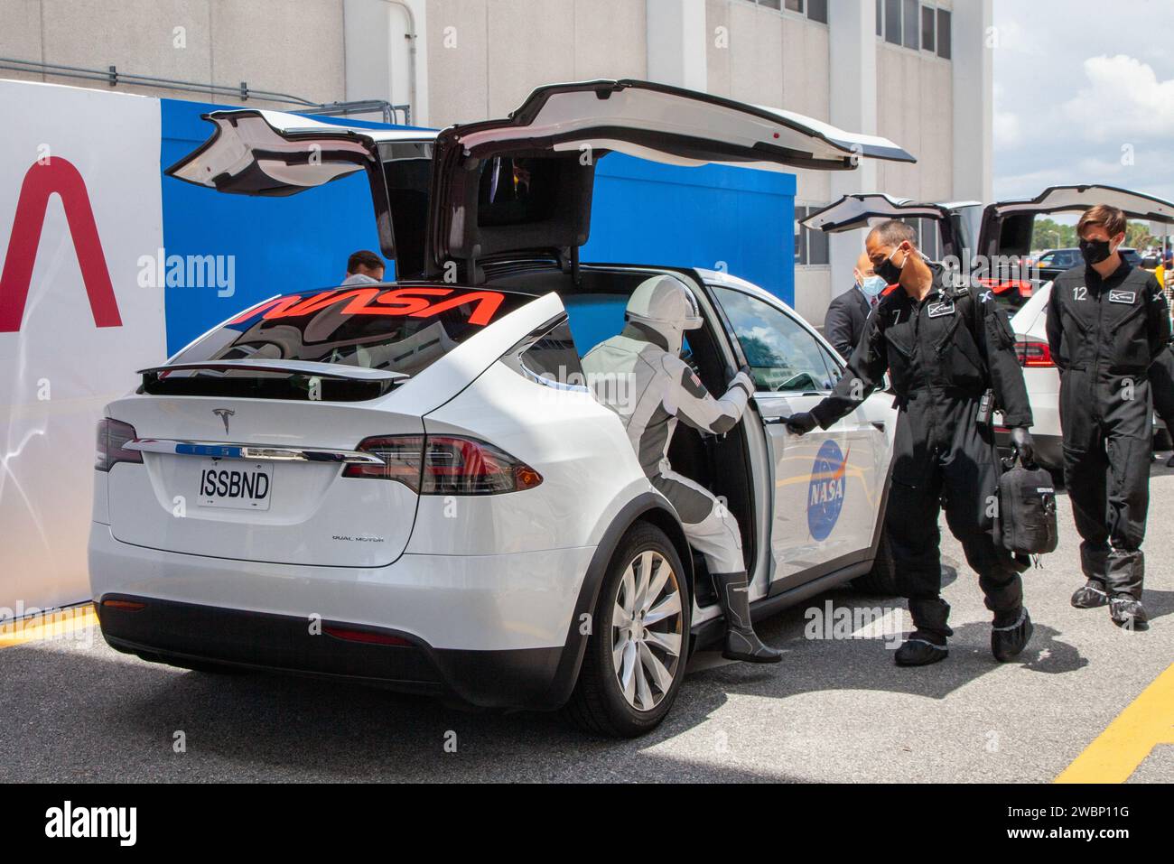 NASA astronauts Robert Behnken and Douglas Hurley (right) enter the ...