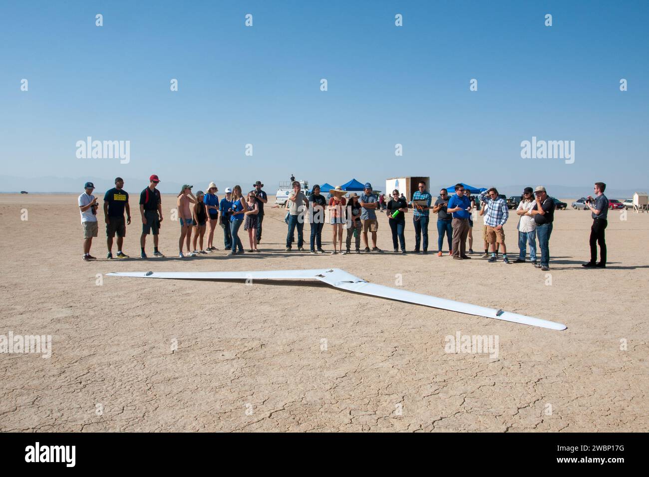 Student interns and NASA personnel gather in front of PRANDTL-D No. 3 ...