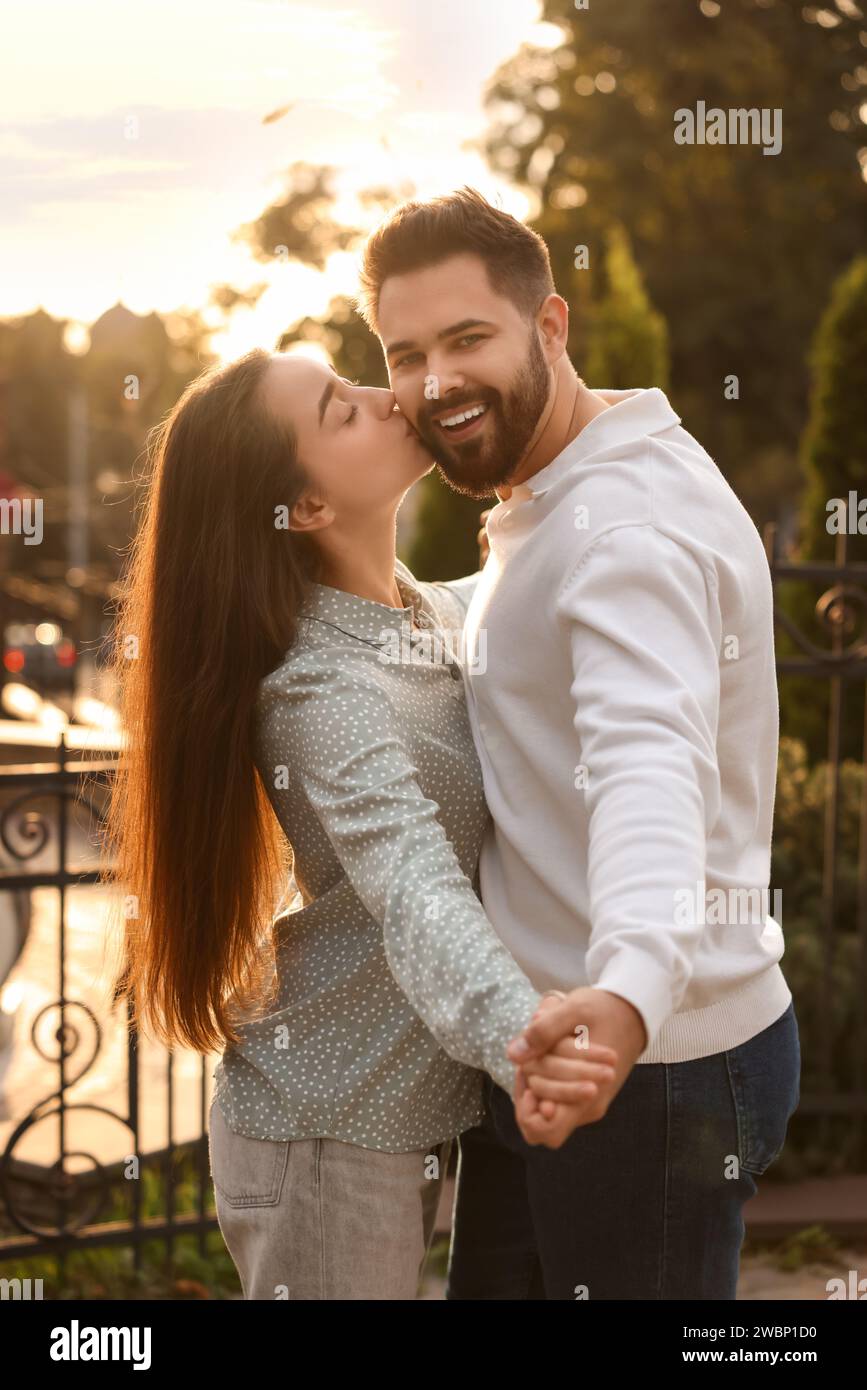 Lovely couple dancing together outdoors at sunset Stock Photo - Alamy