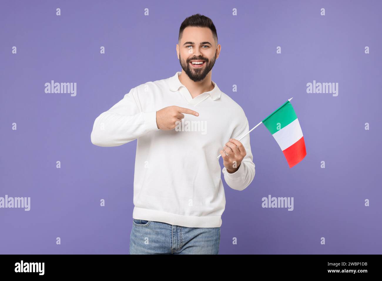 Young man pointing flag hi-res stock photography and images - Alamy