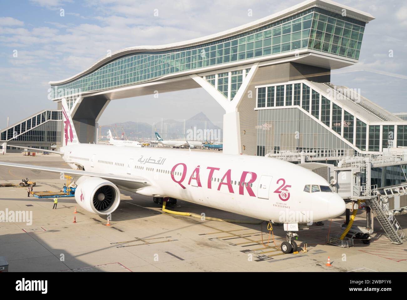side view of Qatar aircraft painted with QATAR logo celebrating 25 ...