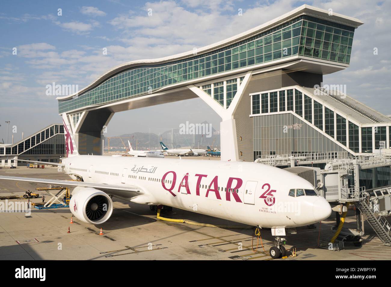 side view of Qatar aircraft painted with QATAR logo celebrating 25 ...