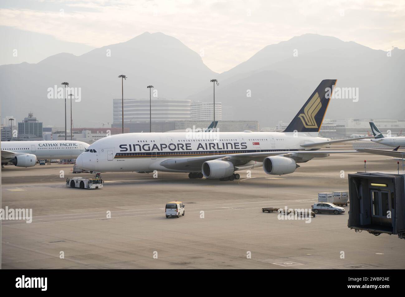 Aircraft on airside apron of Singapore airlines at Hong Kong ...