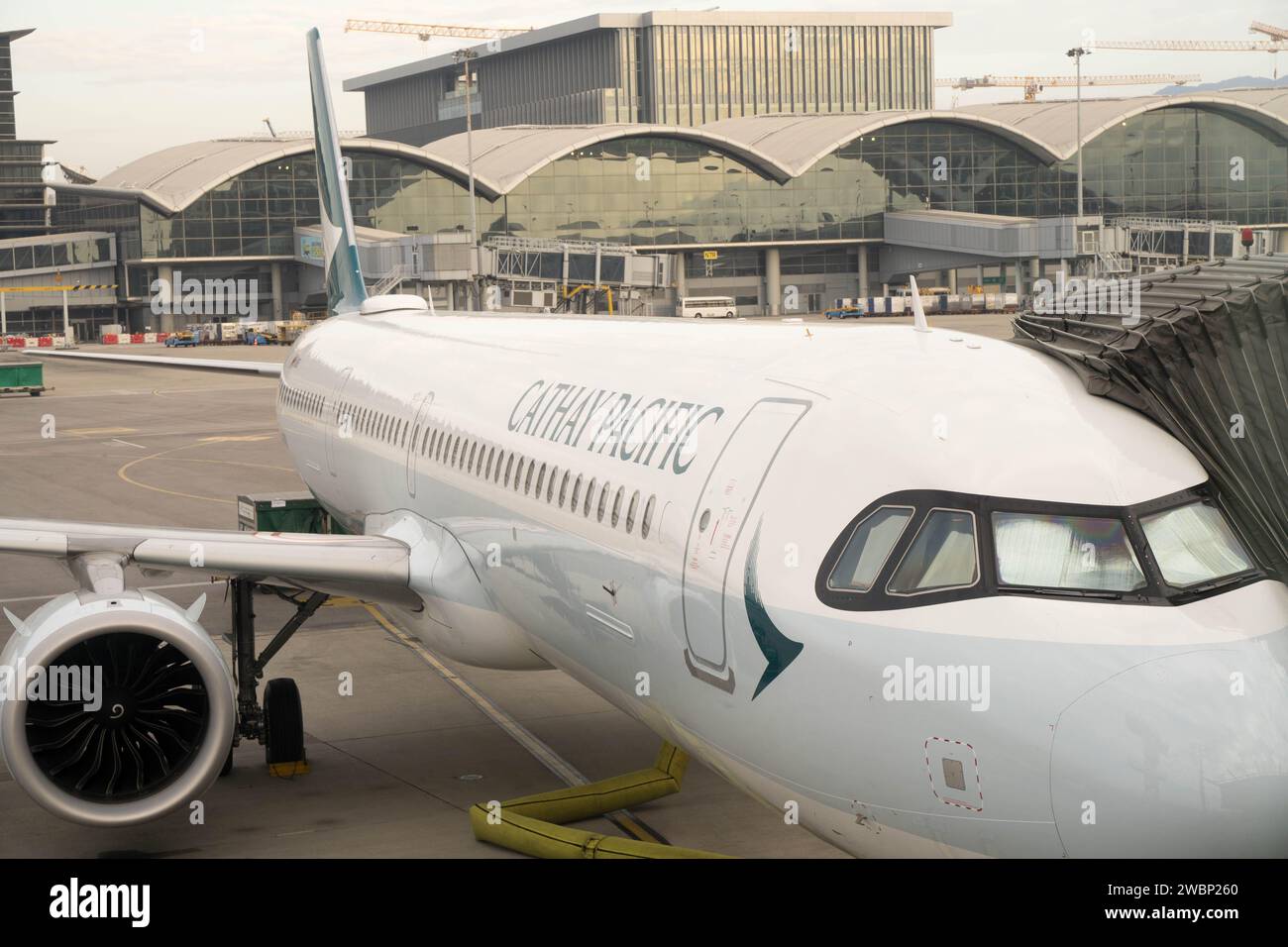 front to back view of Cathay Pacific aircraft parked on tarmac apron at ...