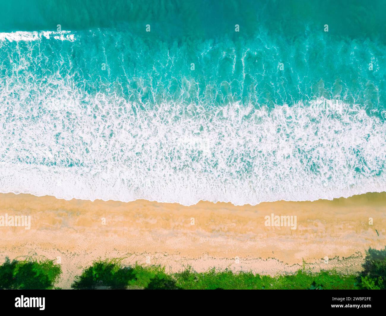 Top view beach with waves crashing on sandy shore,Beautiful waves sea ...