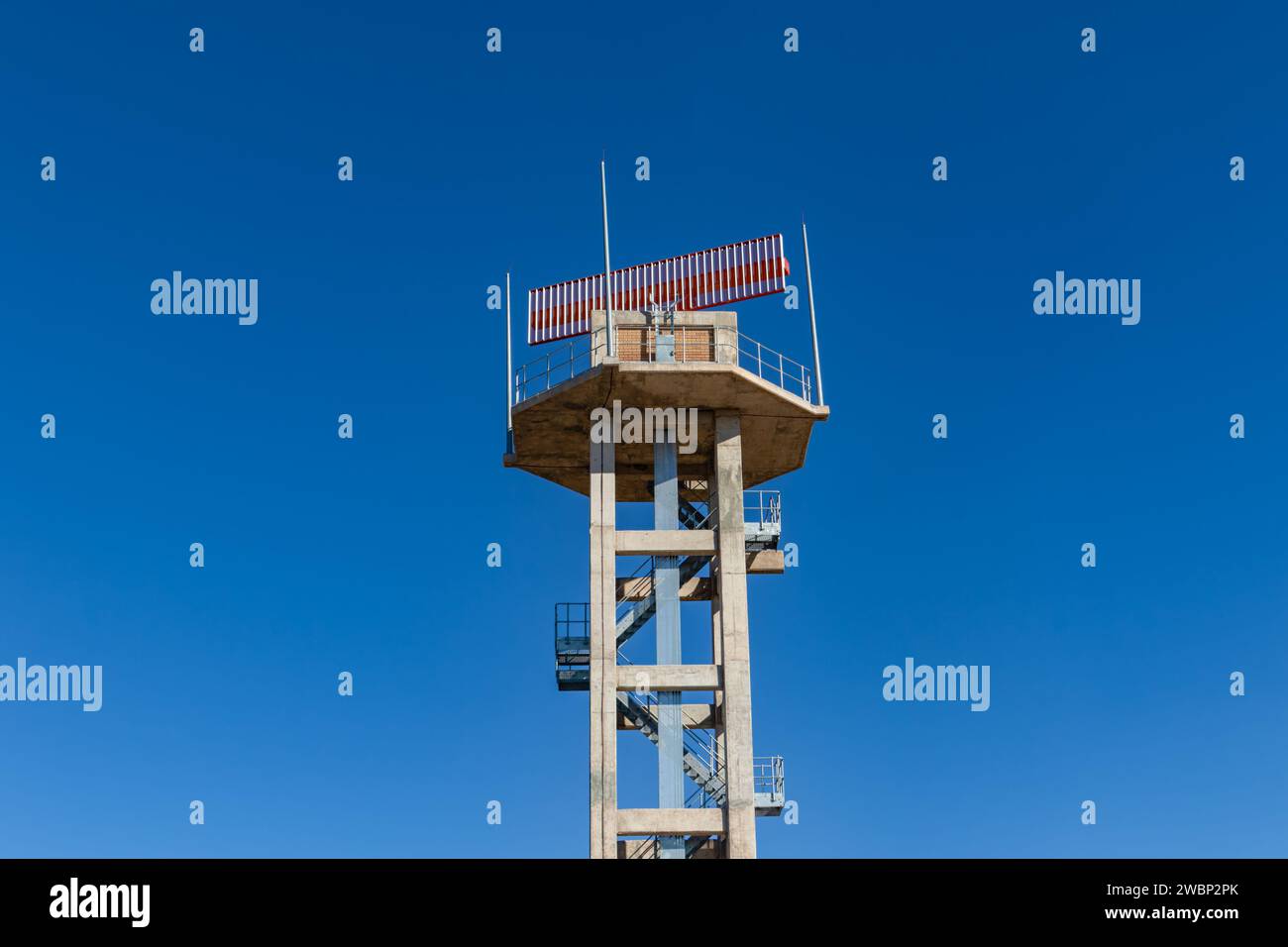 military radar tower against the blue sky, terrestrial building Stock ...