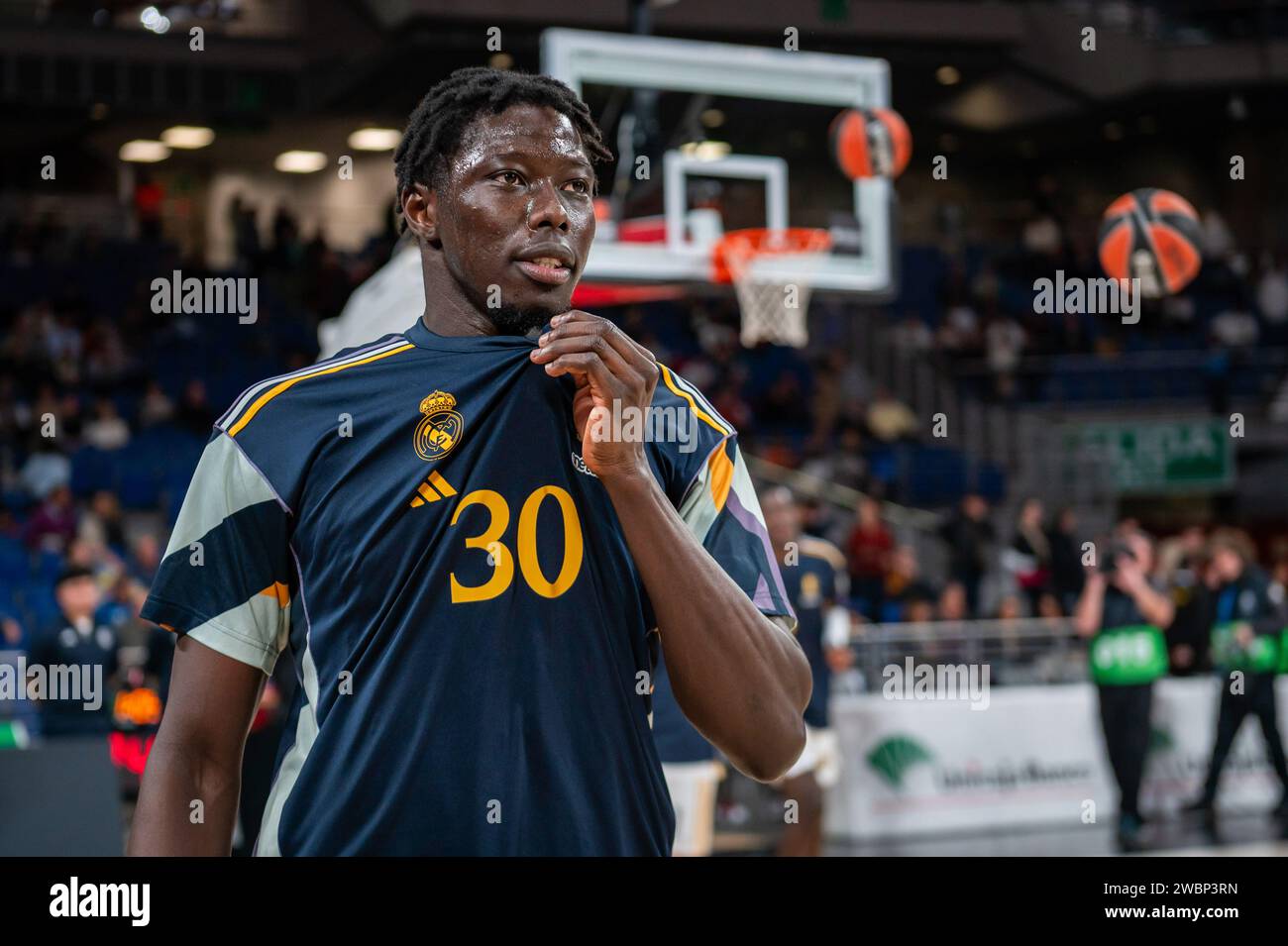 Madrid, Spain. 11th Jan, 2024. Eli Ndiaye of Real Madrid warms up before the Euroleague ...