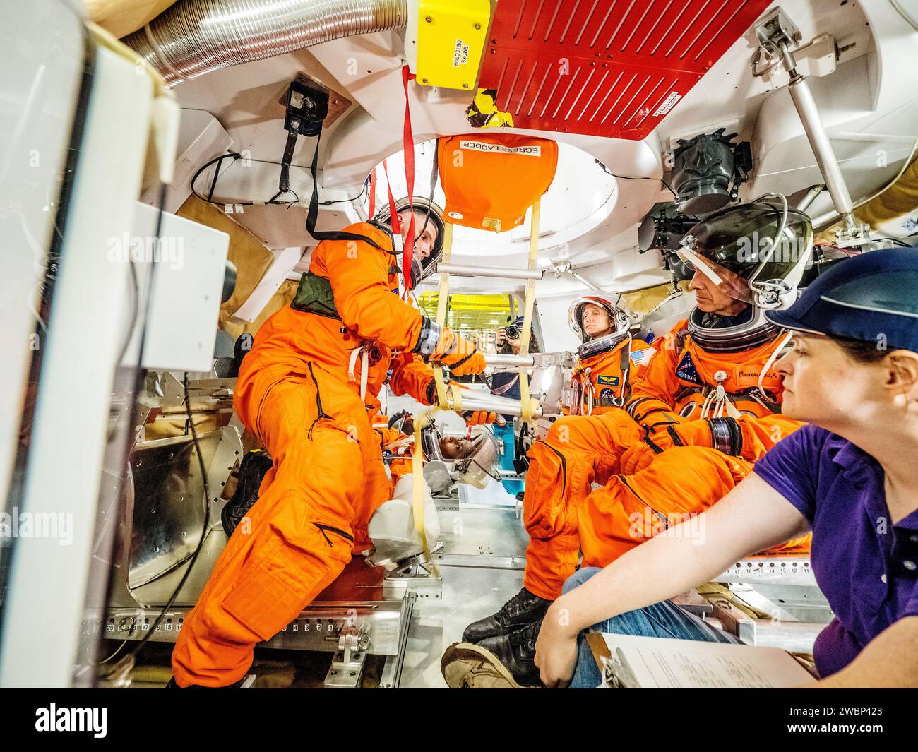 Engineers and astronauts conduct testing in a representative model of ...