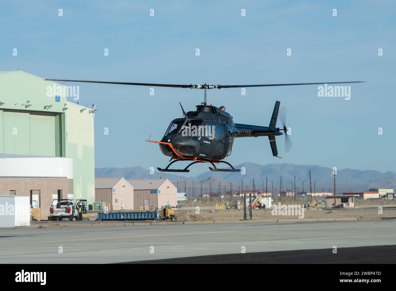 A Bell OH-58C Kiowa helicopter provided by Flight Research Inc. in ...