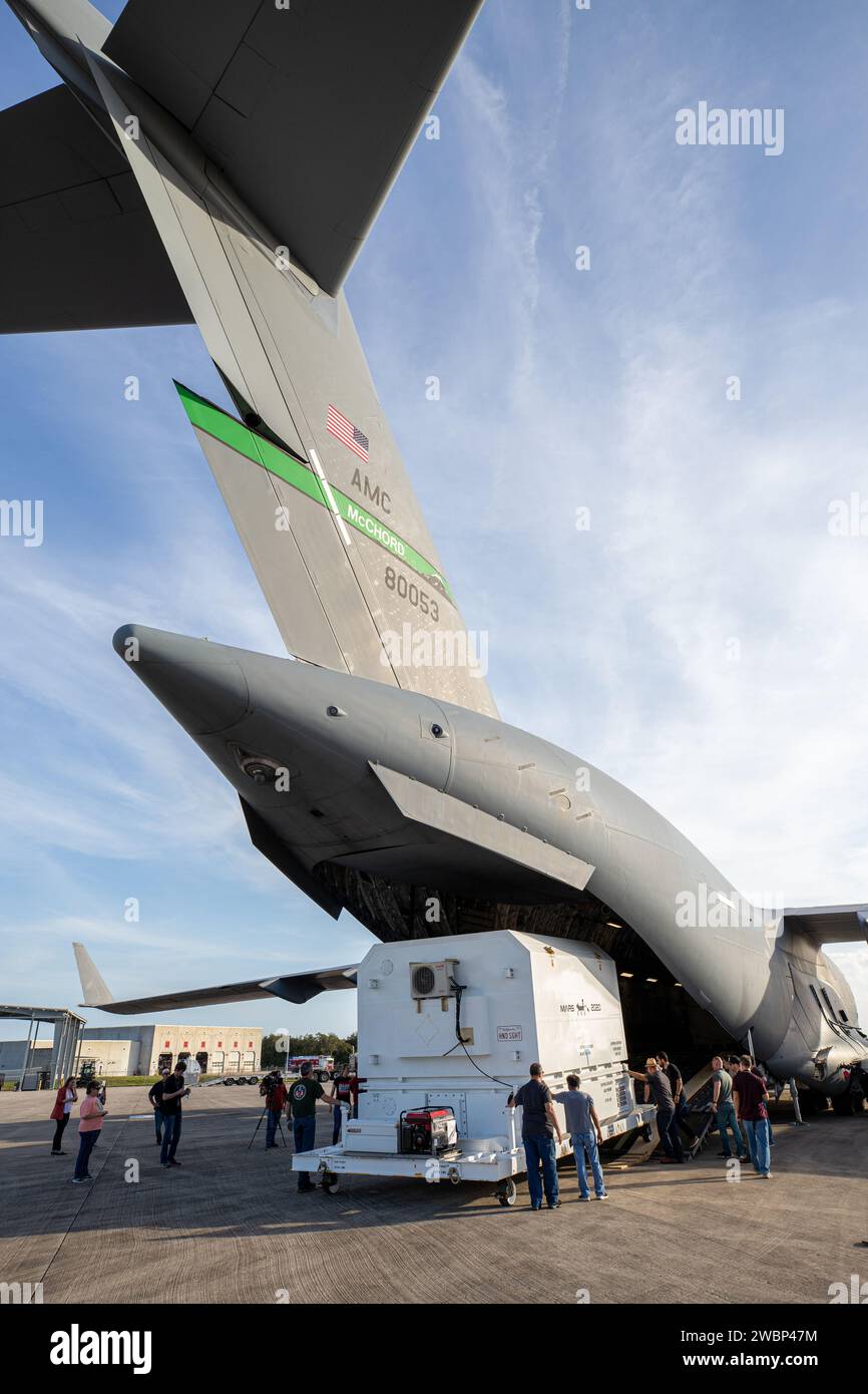 The Mars 2020 rover is offloaded from a C-17 aircraft at the Launch and ...