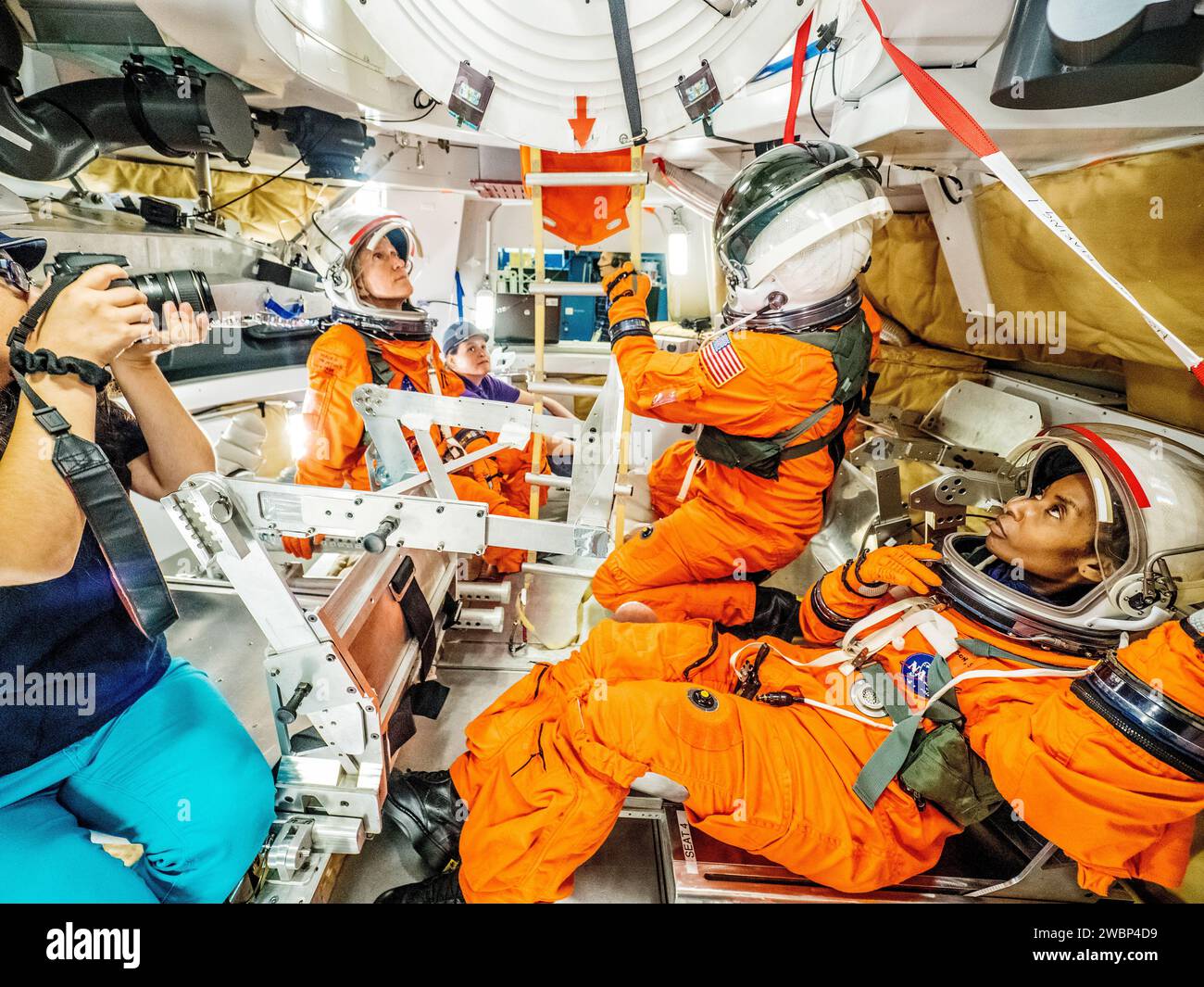 Engineers and astronauts conduct testing in a representative model of ...