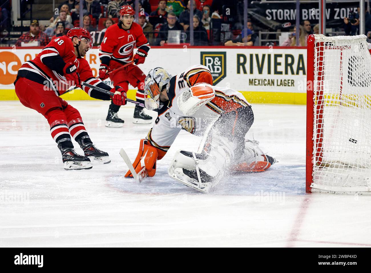 Carolina Hurricanes' Jordan Martinook (48) shoots the puck past Anaheim ...