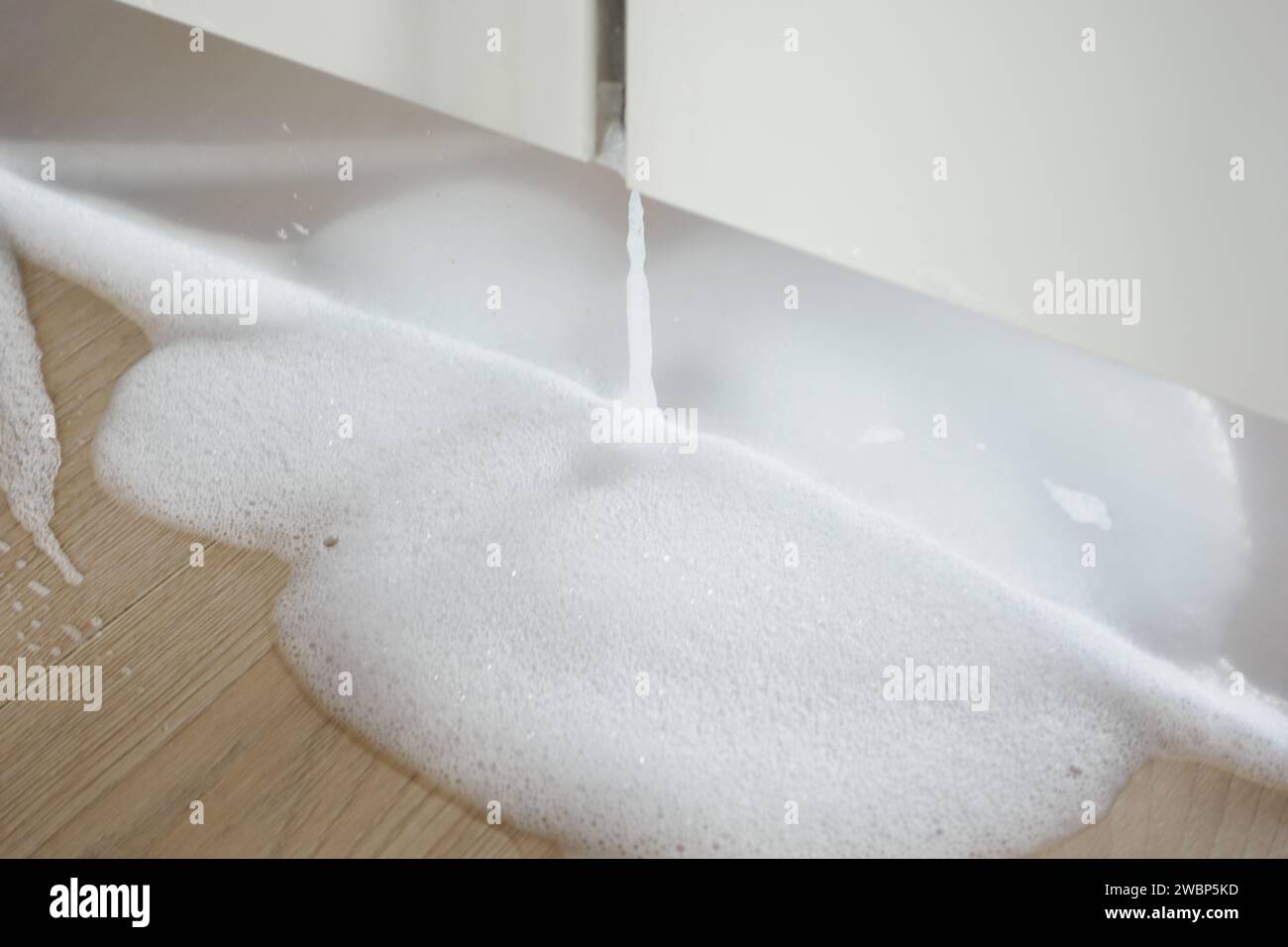 Spilled water on kitchen floor hi-res stock photography and images - Alamy
