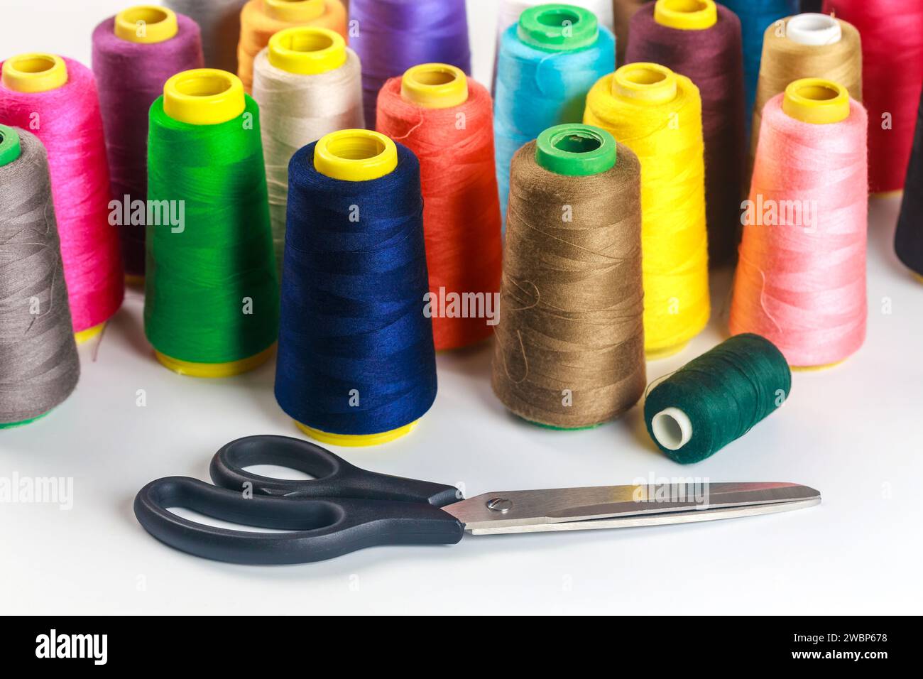 Spools of thread in various colors for sewing Stock Photo - Alamy