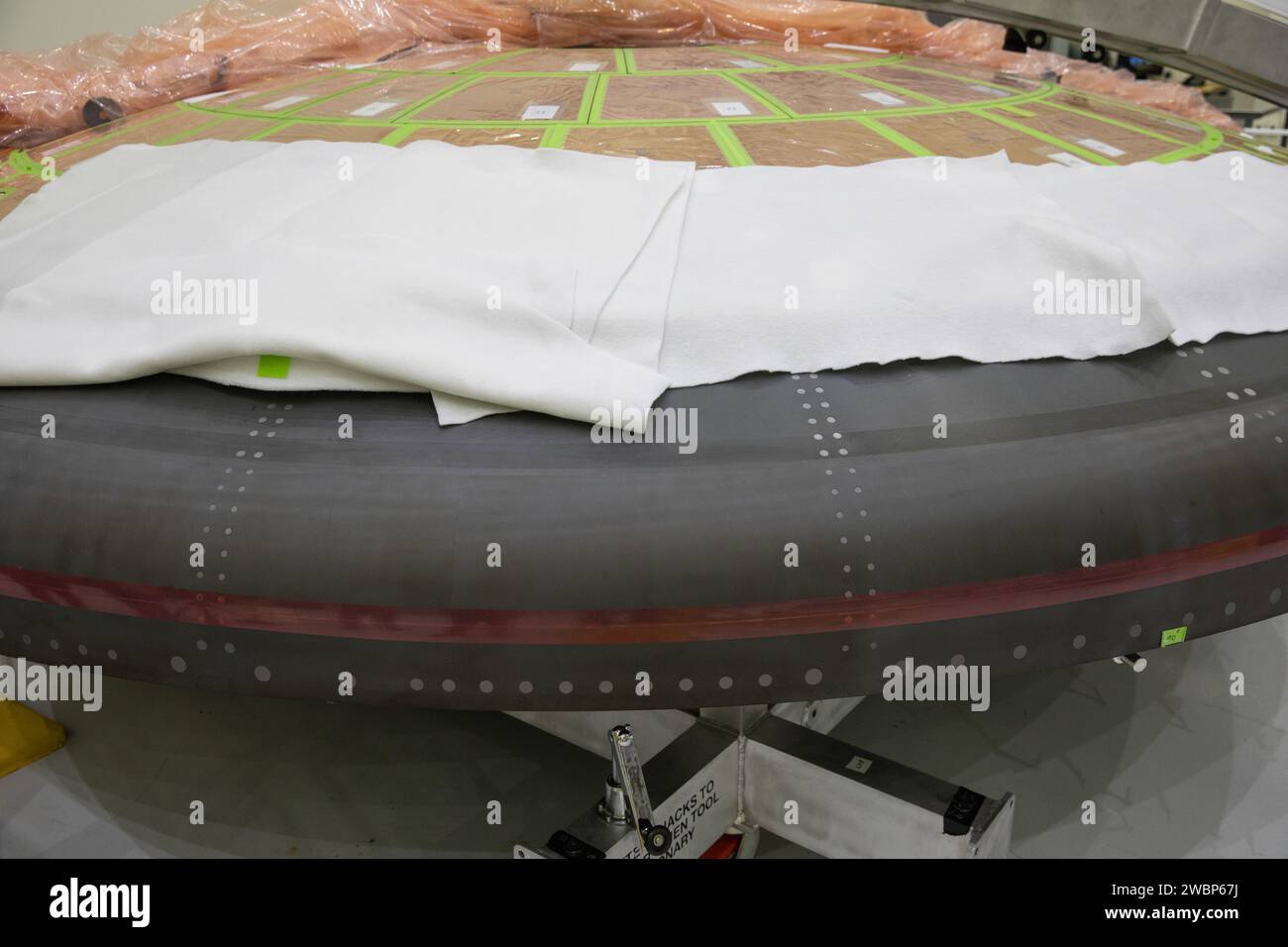 The heat shield for NASA’s Artemis II mission is in view inside the ...