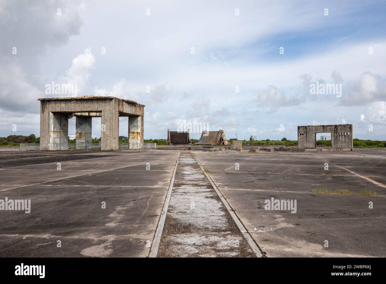 A view of the launch pedestal (at left) still standing at Launch ...