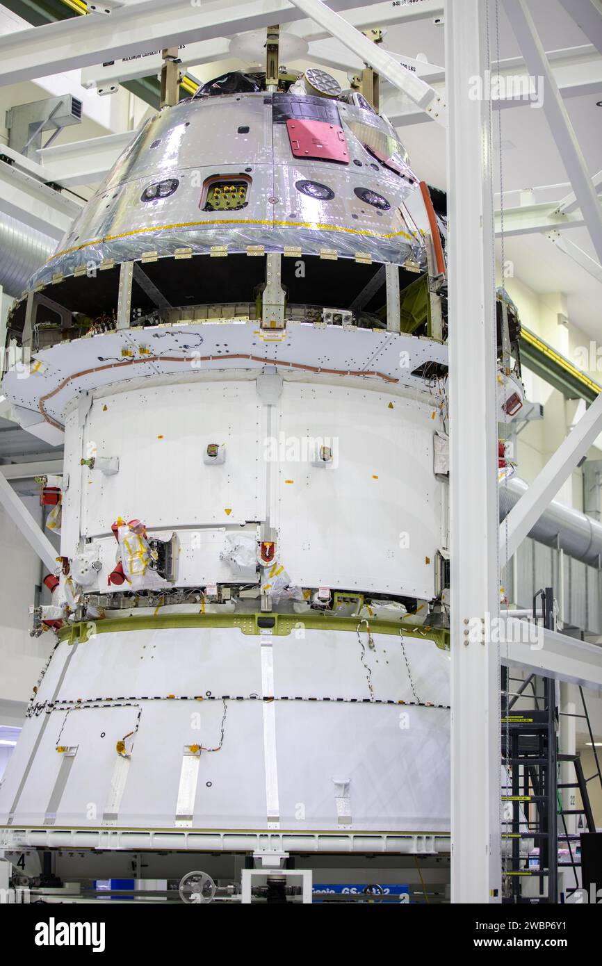 Installation of the spacecraft adapter (SA) cone to the Artemis I Orion ...