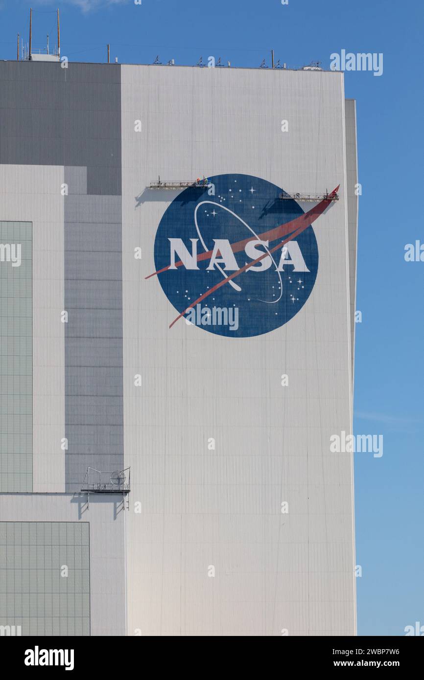 Painting of the NASA logo, also called the meatball, is underway on the ...