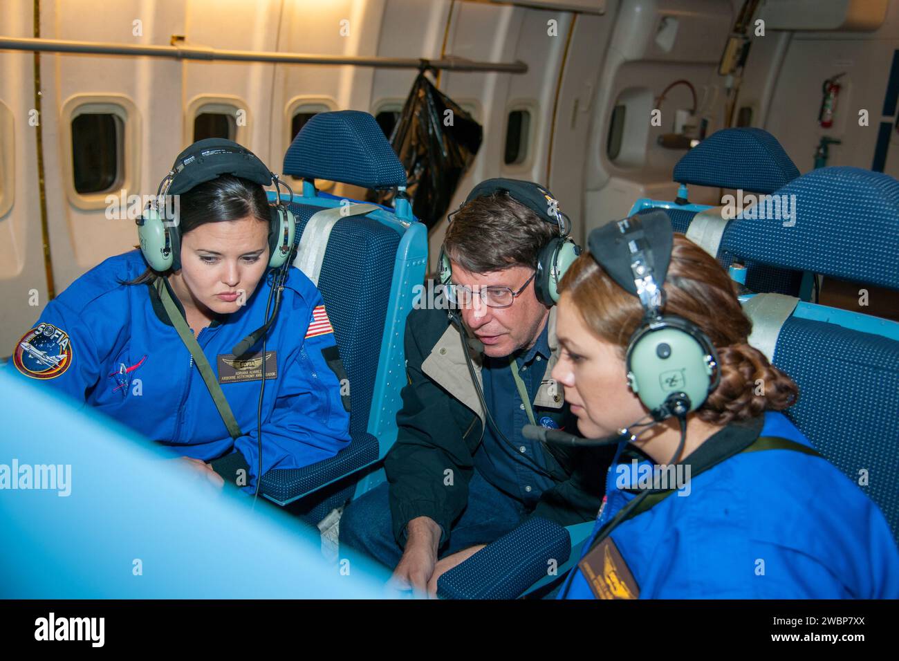 Dana Backamn explains SOFIA’s observations during a flight with Airborne Astronomy Ambassador ...