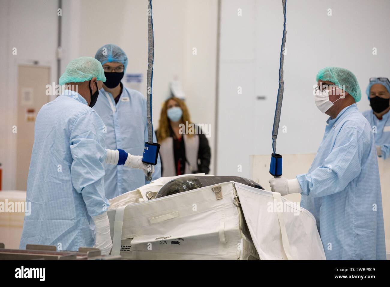 Technicians prepare to unpack and inspect a Nitrogen/Oxygen Recharge ...