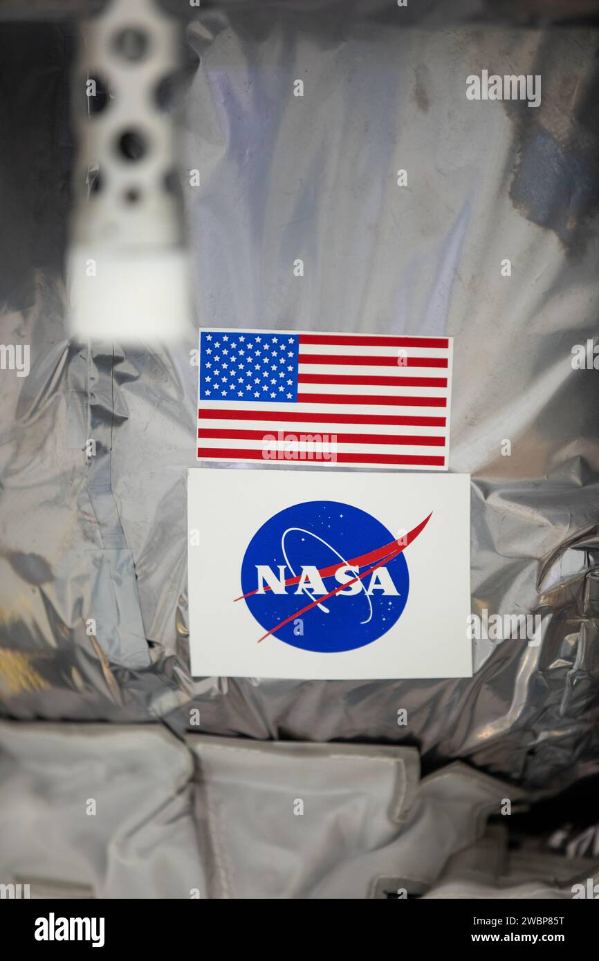 Teams with Astrobotic install the NASA meatball decal on Astrobotic’s ...