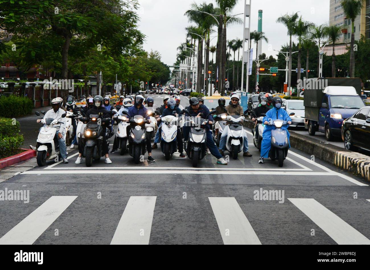 Taipei people riding scooter hi-res stock photography and images - Alamy