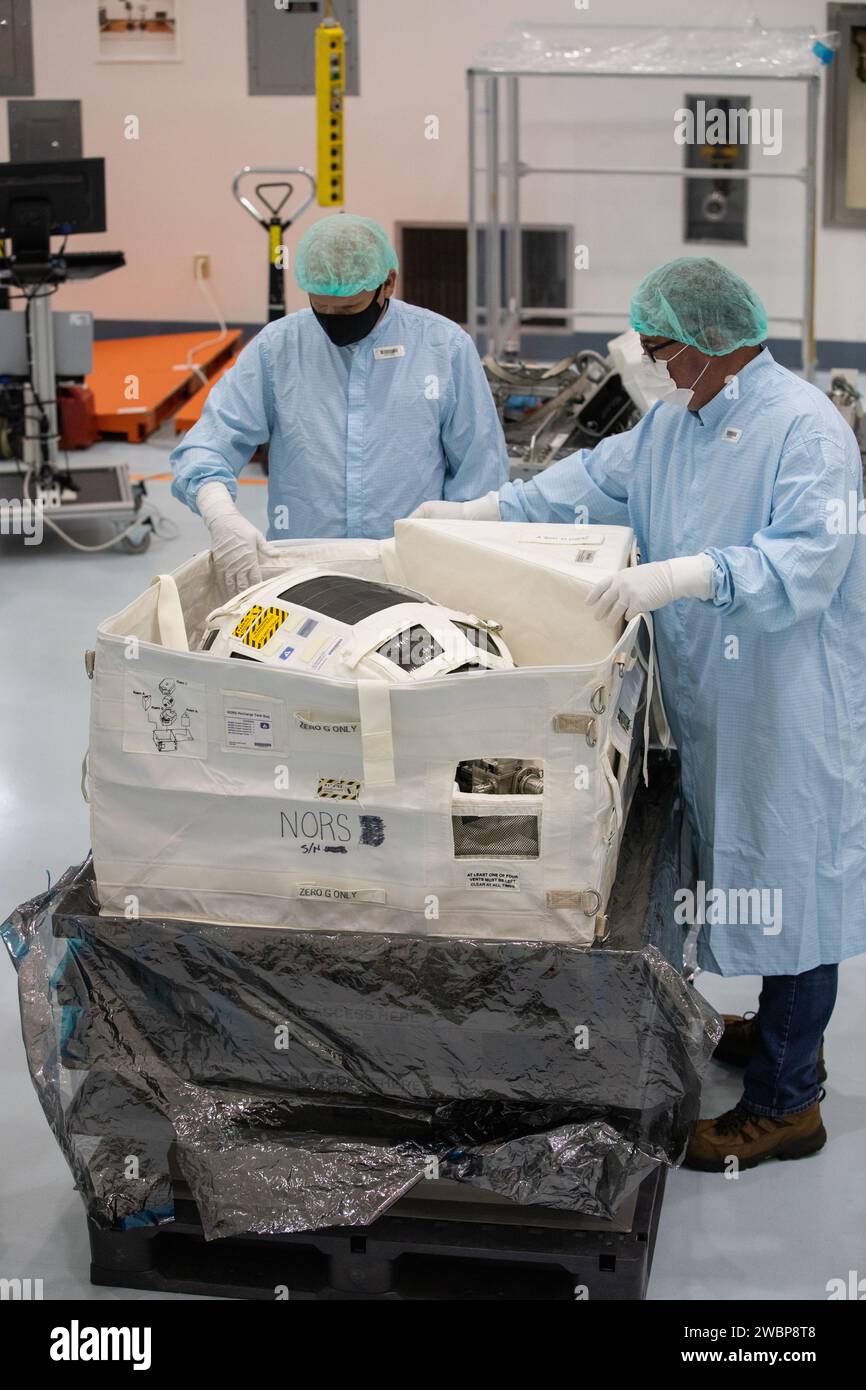 Technicians unpack and inspect a Nitrogen/Oxygen Recharge System (NORS ...