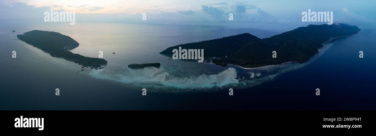 Healthy coral reefs surround the islands of Kri and Mansuar in Raja ...