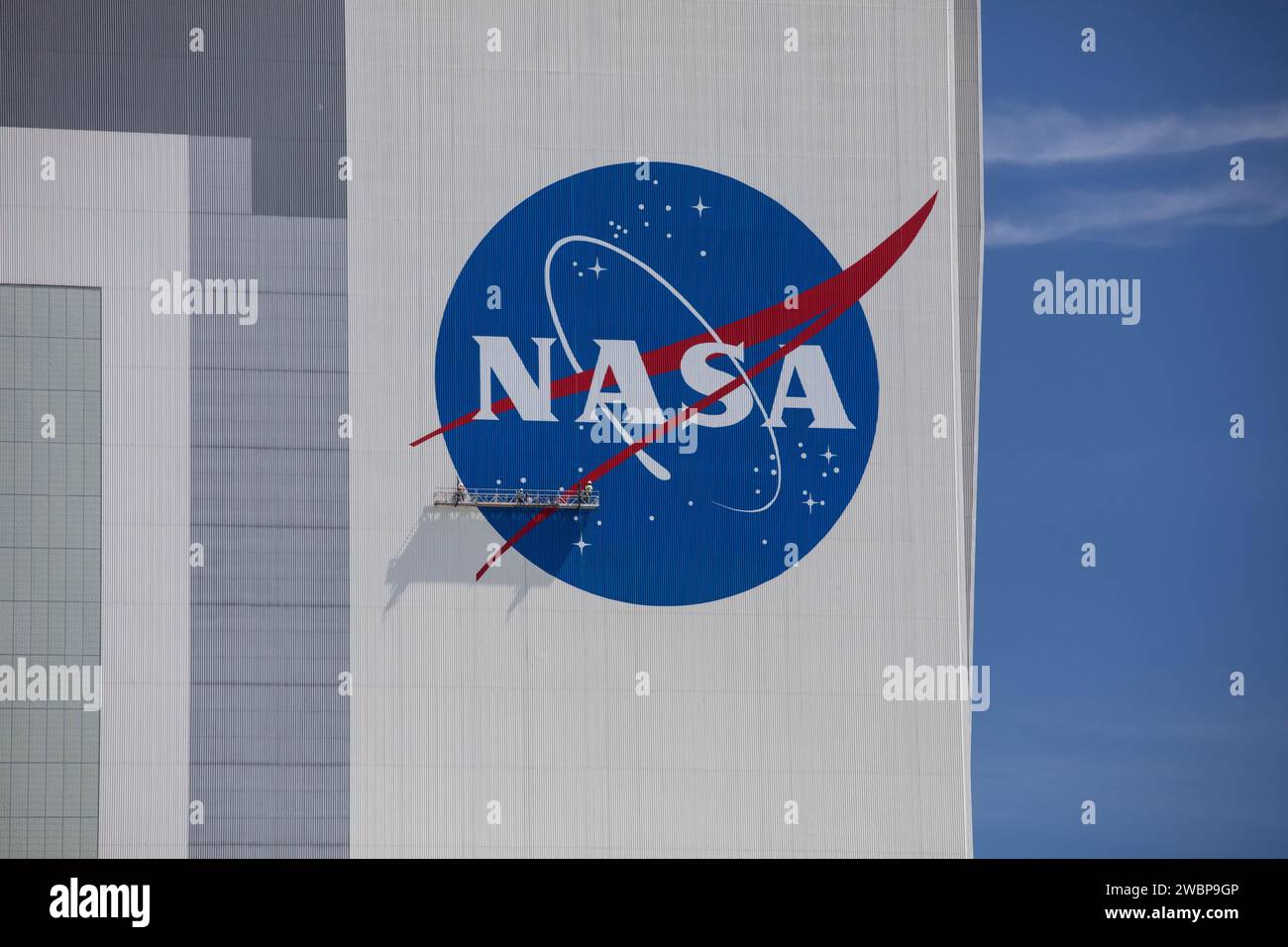 Painting of the NASA logo, also called the meatball, continues on the ...
