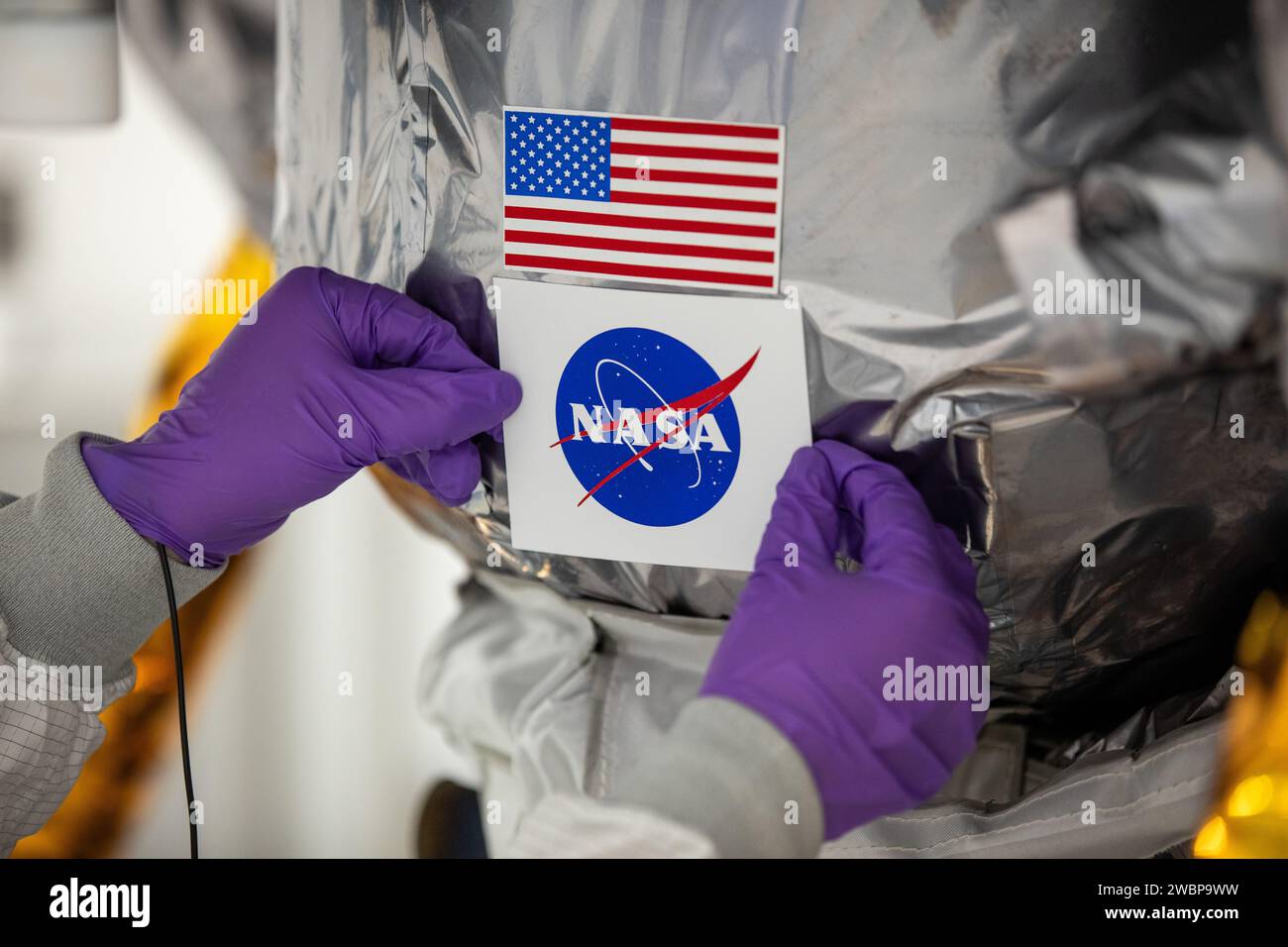 Teams with Astrobotic install the NASA meatball decal on Astrobotic’s ...