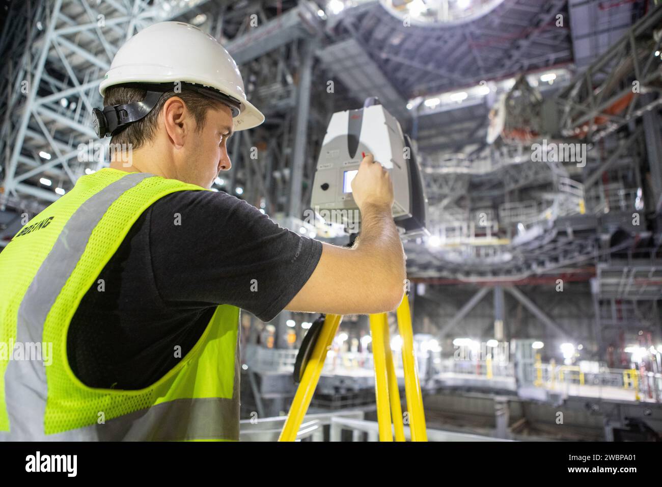 An engineer sets up equipment from the Design Visualization Lab inside ...