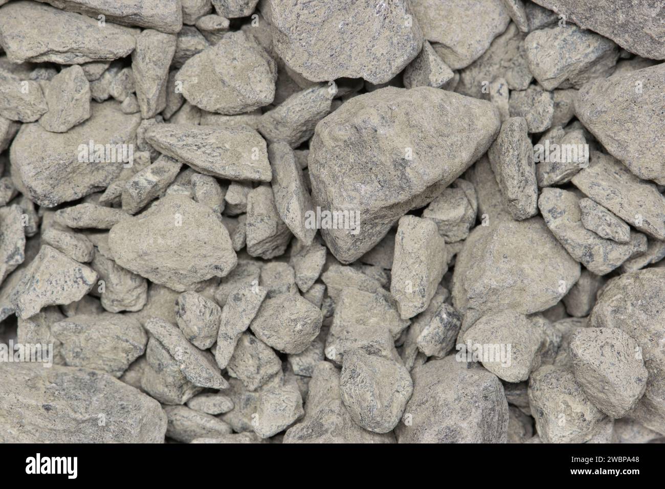 Gray pea gravel sample, macro details directly above. Common material ...