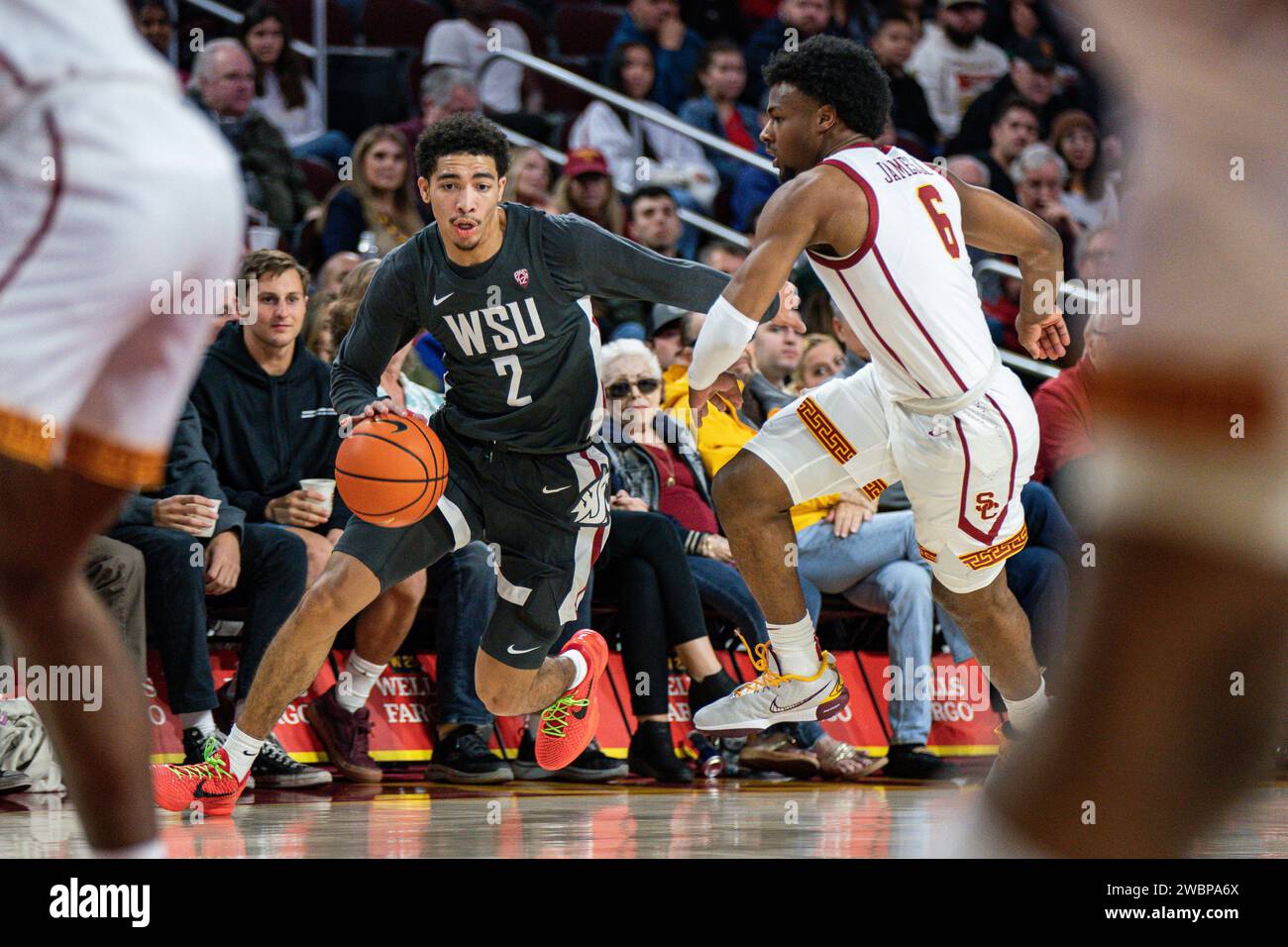 Washington State Cougars guard Myles Rice (2) is defended by USC ...