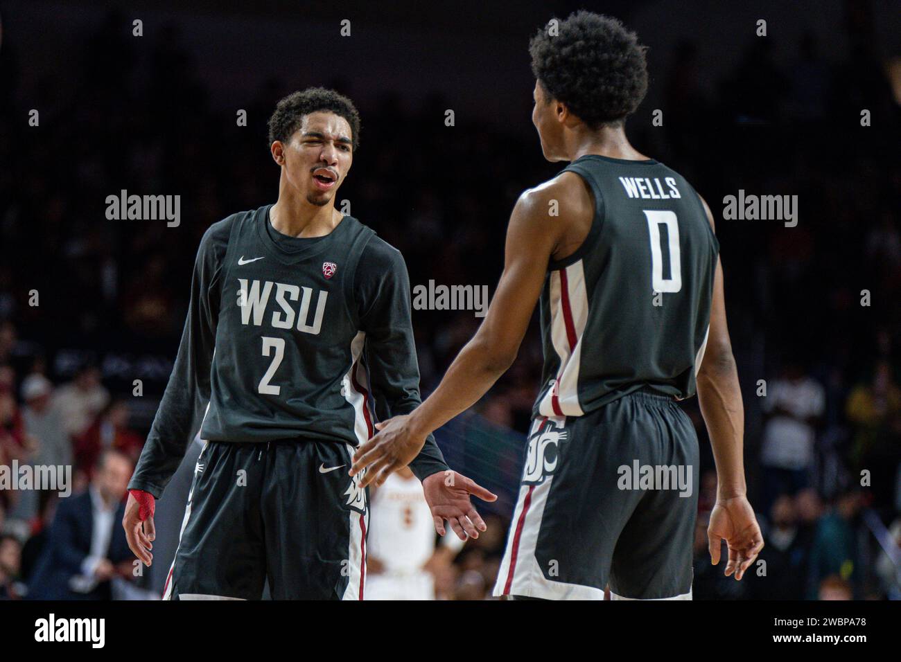 Washington State Cougars guard Myles Rice (2) and forward Jaylen Wells ...