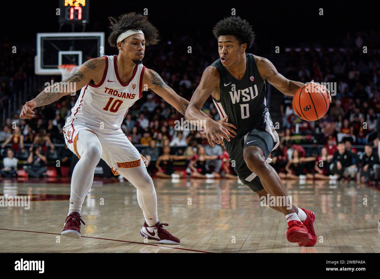 Washington State Cougars forward Jaylen Wells (0) drives against USC ...